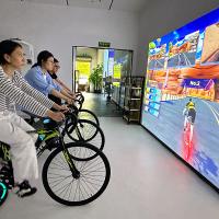 China Interactive Projection Bike with 3500 Lumens Brightness and 1280*800 Resolution for Lifetime Free Game Updates for sale