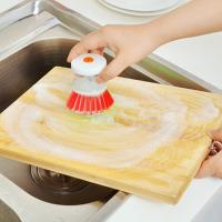 China Kitchen Cleaning Brush with ABS Handle Soap Dispensing Plastic Dishwashing Brush for sale