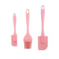China Pink Silicone Scraper Three-piece Set Heat Resistant Spatulas BBQ Brush Baking Tools for sale