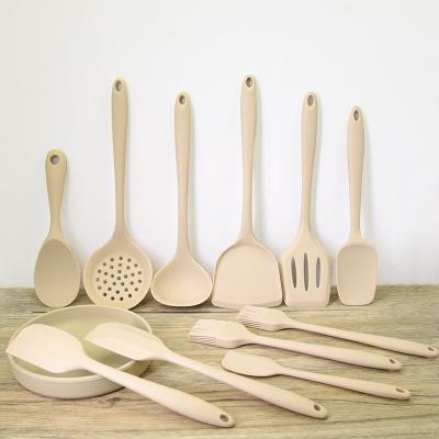 China 11-Piece Silicone Kitchen Utensil Set with Round Holder Multi-Functional Cooking Tools for sale