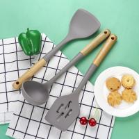 China Silicone Kitchen Three-piece Set Heat Resistant Shovel Non-stick Spoon Wooden Handle for sale