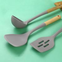 China Silicone Kitchen Three-piece Set Heat Resistant Shovel Non-stick Spoon Wooden Handle for sale