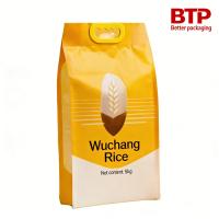 China Custom HD Printed Recyclable Zipper Top Food-Grade Handle Bags Custom Logo for Premium Rice Branded Display Freshness Retention for sale