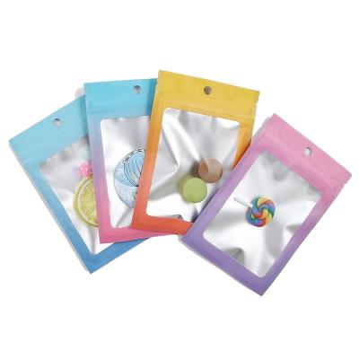 China Low MOQ 100pcs Matte Colorful PE Mylar Heat Seal Zipper Bags with Window Moisture Proof Food Packaging for Milk Jelly Snacks for sale