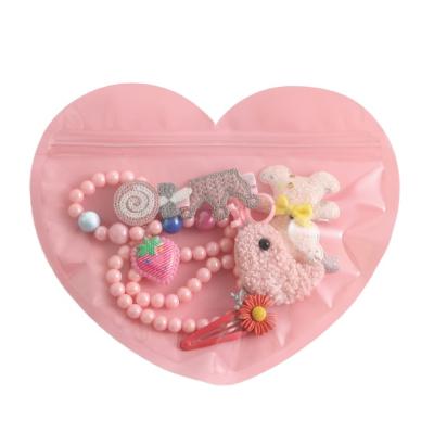 China MOQ 100pcs Custom Printed Pink Heart-shaped Valentine's Day Candy Packaging Bag with Zipper Top Self-sealing Food Bag for sale