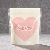 China MOQ 100pcs Custom Printed Pink Heart-shaped Valentine's Day Candy Packaging Bag with Zipper Top Self-sealing Food Bag for sale