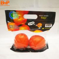 China Biodegradable Material BOPP/CPP Orange Fresh Fruit Protection Packaging Zipper Bag With Hand Pick Hole for sale