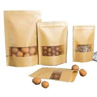 China Kraft Paper Coffee Bags Stand up Coffee Pouches With One Way Degassing Valve and Reusable Side Zipper for sale