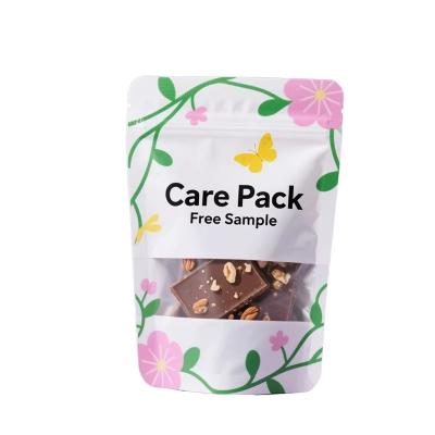 China Custom Printed Clear Window Disposable Stand up Pouch Resealable Food Grade Zipper Bag for Snacks Cake Confectionery for sale
