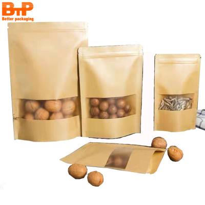 China Custom-Printed Biodegradable  Brown Kraft Paper Pouch Bag Clear Window Pouches  Stand up Food Packaging Zipper Bags for sale