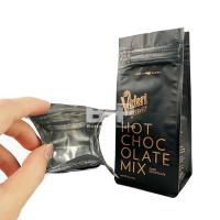 China Custom Logo Flat Bottom Plastic Packaging Black Bag With Pocket Zipper And Valve For Coffee Beans And Tea Leaf And Hot Chocolate for sale