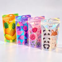 China Custom Holographic Stand Up Ziplock Food Packaging Bags Low MOQ 100 For Snack for sale