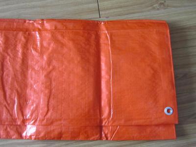 China Anti-UV waterproof orange color 140grams polyethylene tarps/tarpaulin fabric for sale