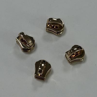 China Anti Scratch #5 Metal Zipper Slider Non Lock Pin Lock Round Edge 25mm for sale