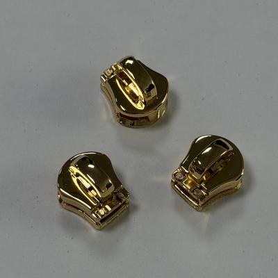 China Bright Luster #5 Metal Zipper Slider Non Lock Fade Resistant Zipperhead Replacement for sale