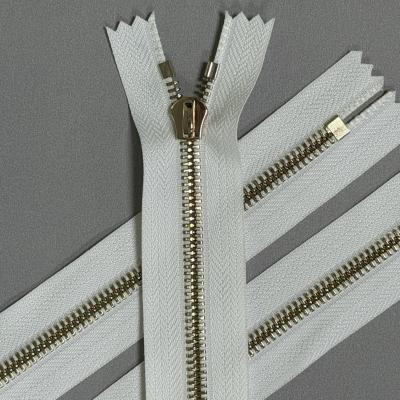 China Light Gold Flexible Brass Zipper #5 Double Pointed Teeth Metal Zipper 80cm for sale