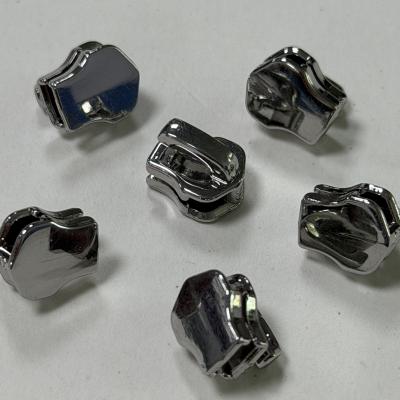 China Durable #3 Metal Zipper Non Lock Pin Lock Slider 100mm Electroplated Finish for sale