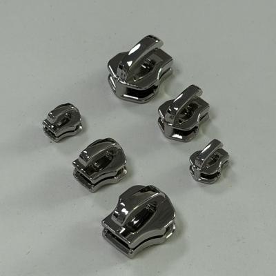 China Firm #3 Metal Zipper Non Lock Pin Lock Slider 5mm Bright Nickel Durable for sale