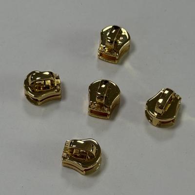 China High Strength Metal Zipper Slider #5 Non Lock Deformation Resistant for Bags and Apparel for sale
