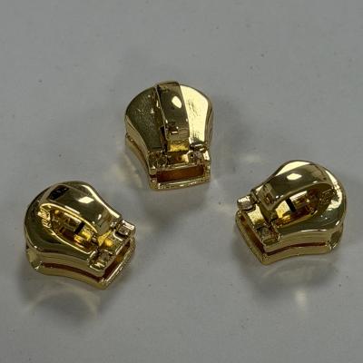 China Zinc Alloy Non Lock Box Slider #5 Sturdy Metal Zipper Slider Gold Plated for sale