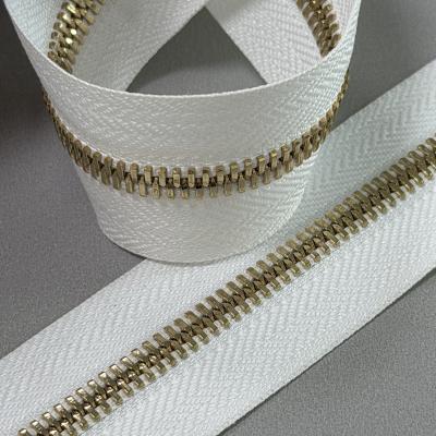 China Light Gold Metal Zip #5 Double Pointed Teeth Zipper Customized for sale