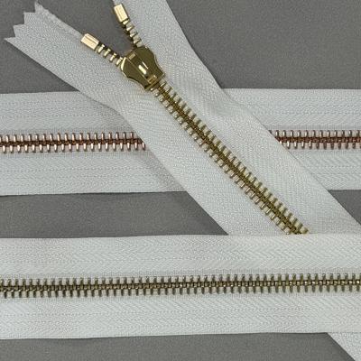 China Brass #5 Euro Teeth Metal Zipper Light Gold High Tensile Strength for Luxury Apparel for sale