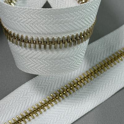 China High Standards #5 Euro Teeth Metal Zipper Shiny Gold 55cm Salt Spray Resistant for sale