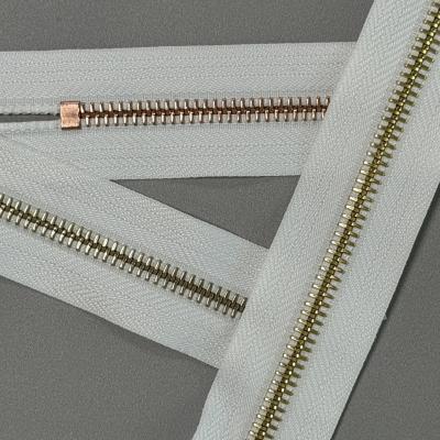 China #5 Euro Teeth Metal Zipper Customizable Colors 100% Brass High Speed Milling for sale