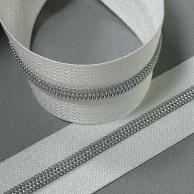 China Vacuum Plated No.3 Nylon Zipper Rust Proof Environmental Friendly Silver Teeth Zipper for sale