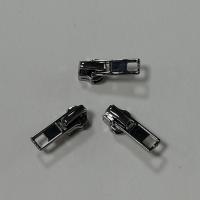 China Auto Lock Metal Zipper Slider #3 Anti Slip Self Locking for Bags Workwear for sale