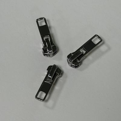 China Smooth Wear Resistant #5 Auto Lock Zipper Puller Metal Slider Standard Pull Tab for sale