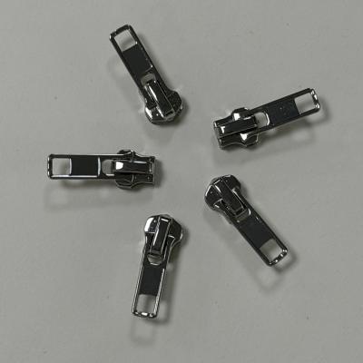 China Customized #5 Auto Lock Metal Zipper Head Replacement Standard Pull Tab for sale