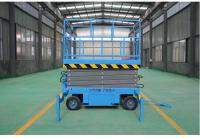 China 100-550Kg Capacity Warehouse Storage Cargo Hydraulic Electric Scissor Lift Platform for sale