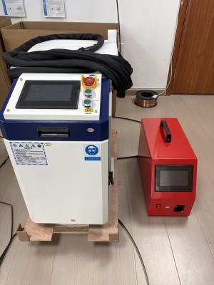 China Factory Price OTA-1500 Portable 3-in-1 Handheld Fiber Laser Welder Cutting Cleaning Machine with Wire Feeder for sale