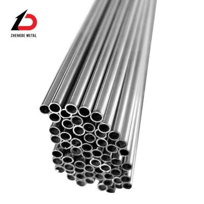 China ASTM A179 A192 SA210 T12 Carbon Steel Seamless Pipe & 304 201 316 Stainless Steel Welded Tube for Heat Exchange Systems for sale