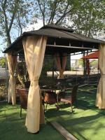 China Hardtop Gazebo Canopy Galvanized Steel Pergolas With Netting Curtains for sale