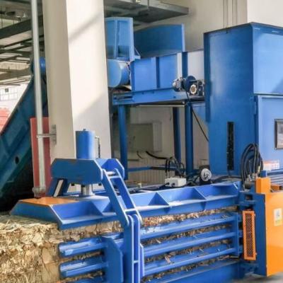 China 1500 Kg Weight Vertical Waste Paper Baler Machine PLC System Water Cooling for sale