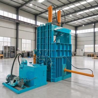 China Hydraulic Waste Baler with 50-200 Tons Pressing Force, Integrated Heavy Steel Welding Structure, and Emergency Stop Safety Features for sale