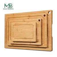 China Deep Juice Groove Bamboo Wood Cutting Board Set with Side Handles for Cheese and Food Chopping Rectangle Middle 300x250x for sale