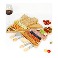 China Unique Irregular Christmas Tree Charcuterie Board Set And Knives Made of Solid Bamboo for sale