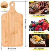 China Kitchen Thick Large Bamboo Cutting Board with Handle Personalized Customized Designs for sale