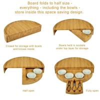 China Best Gift Bamboo Tray Multi-function Round Shape Cheese Cutting Board with Knife Set for sale