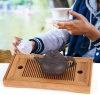 China ODM Chinese Bamboo Wooden Tea Trays With Drain Solid Natural Nanzhu for sale