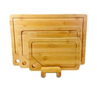 China OEM/ODM Accepted Rectangle Bamboo Three-Piece Cutting Board Set with Hanging Holes for sale