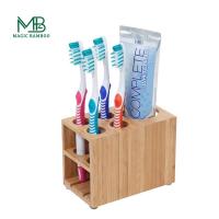 China Organic Sustainable Bamboo Toothbrush Holder Toothpaste Stand For Bathroom Vanity Storage for sale