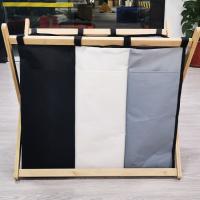 China Oxford Fabric Bathroom Storage Basket Washing Laundry Hamper With Bamboo Handles for sale