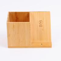 China Fast Bamboo Desktop Wireless Charger Stand with Pen Holder and Clock OEM Acceptable for sale