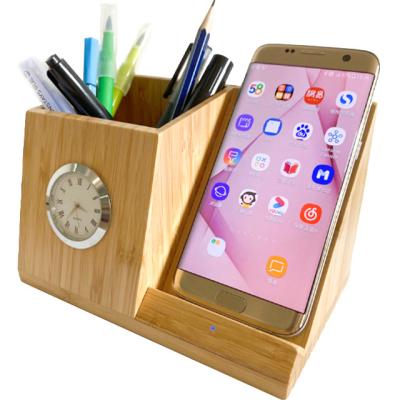 China Living Room Fast Wireless Charger Stand with Pen Holder and Clock Natural Design for sale