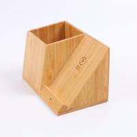 China Living Room Fast Wireless Charger Stand with Pen Holder and Clock Natural Design for sale