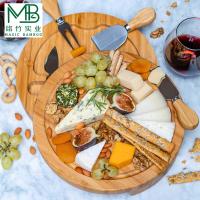 China Multifunctional Bamboo Cheese Deli Cutting Board With 4 Knives For Kitchen for sale